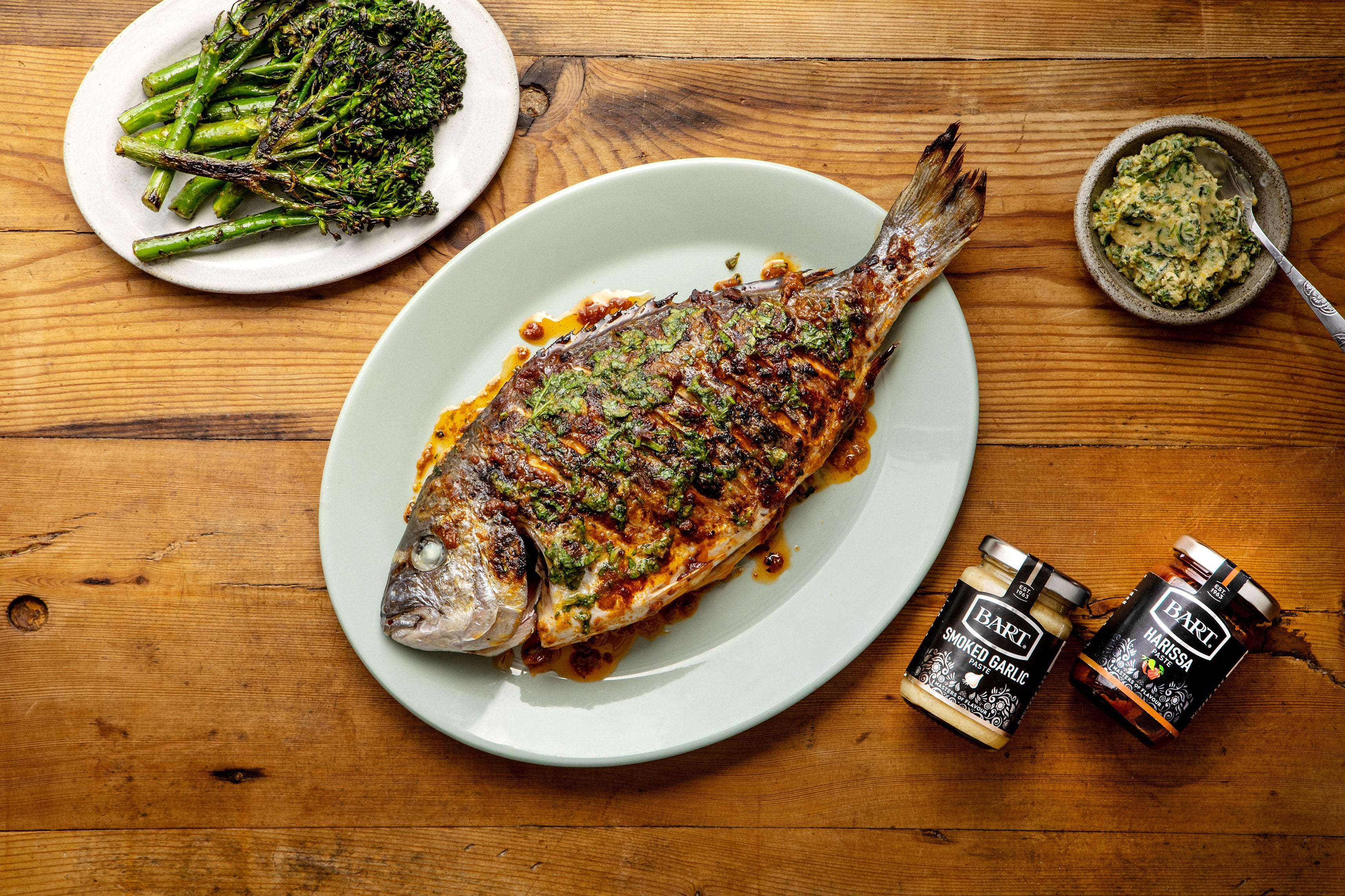 Harissa grilled sea bream with coriander and smoked garlic butter ...